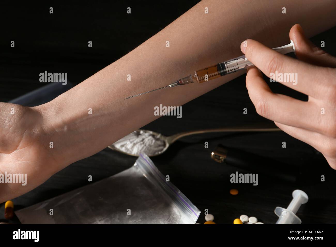 Drug addiction. Woman with syringe against dark background, closeup ...