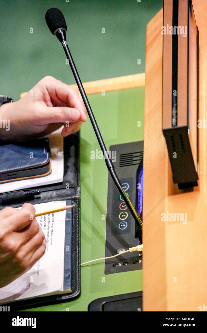 New York, New York, USA. 5th Mar, 2025. A hand sits in front of the ...