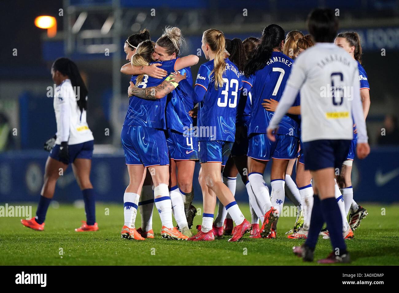 Chelsea's Erin Cuthbert (left) celebrates scoring their side's third ...