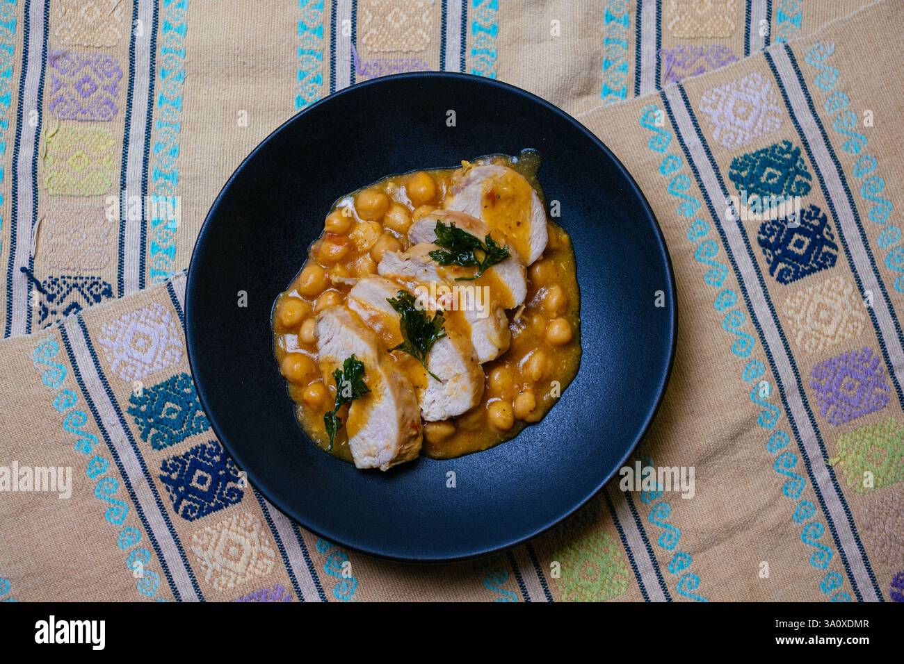 Contemporary rendition of traditional "Garbanzo en Amarillo" indigenous ...