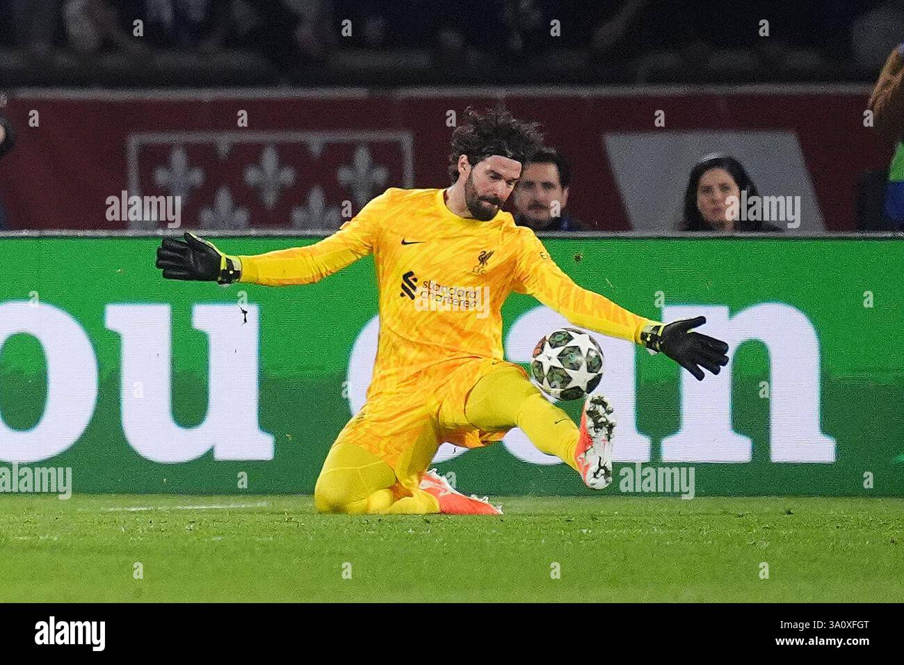 Liverpool goalkeeper Alisson Becker makes a save during the UEFA ...