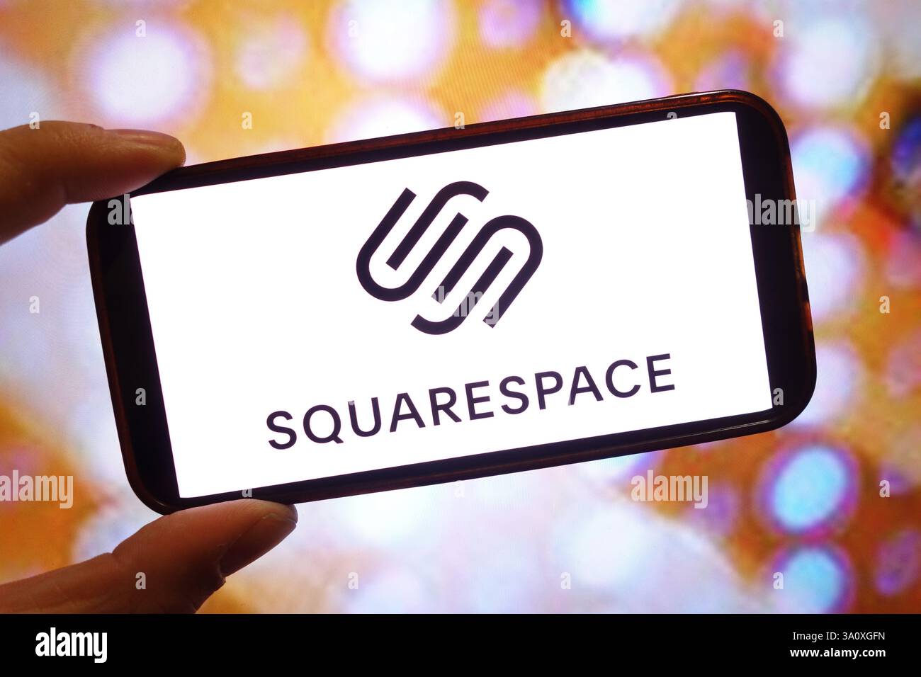 In this photo illustration, the Squarespace Inc company logo is seen displayed on a smartphone ...