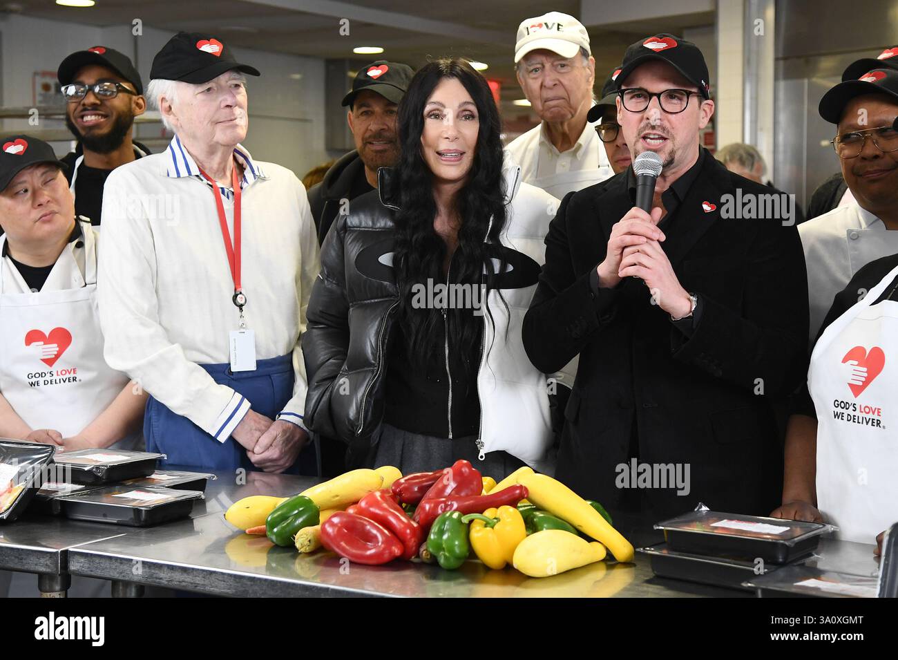 New York, USA. 05th Mar, 2025. American singer Cher (center) visits ...