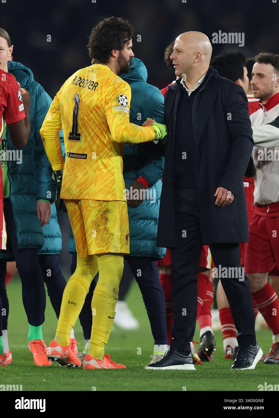 Paris, France, 5th March 2025. Alisson Becker of Liverpool and Arne ...