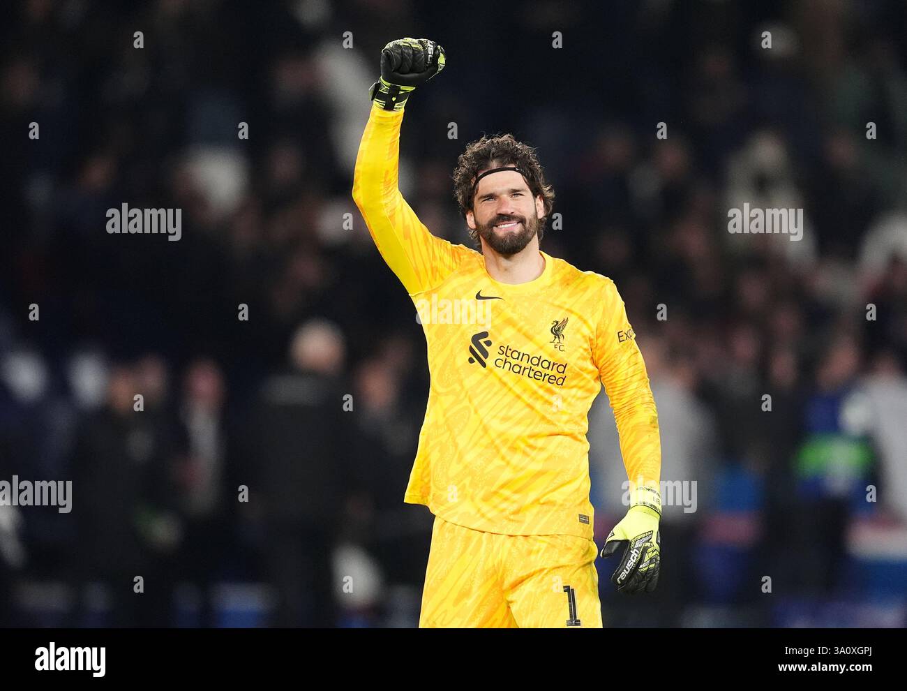 Liverpool goalkeeper Alisson Becker celebrates after the UEFA Champions ...