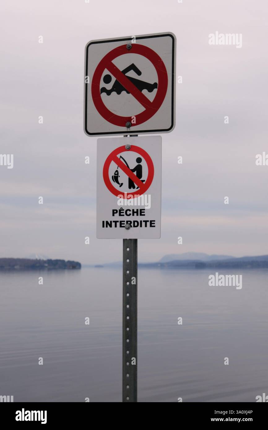 Do Not Swim and Do Not Fishing sign by the Lac Memphrémagog Lake in ...