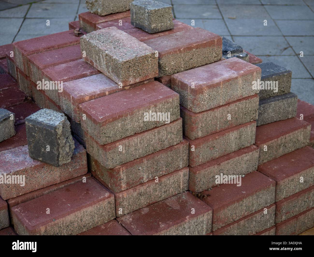 Block with paving stones on the street. Preparation for pavement repair ...