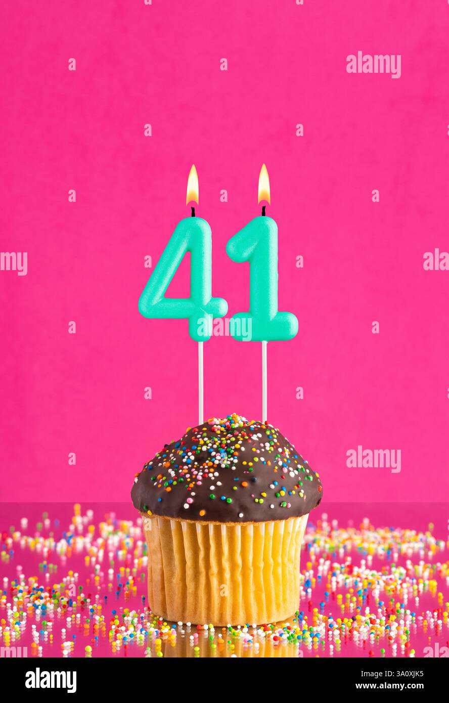 Birthday cupcake with number 41 candle - Celebration card on fuchsia ...