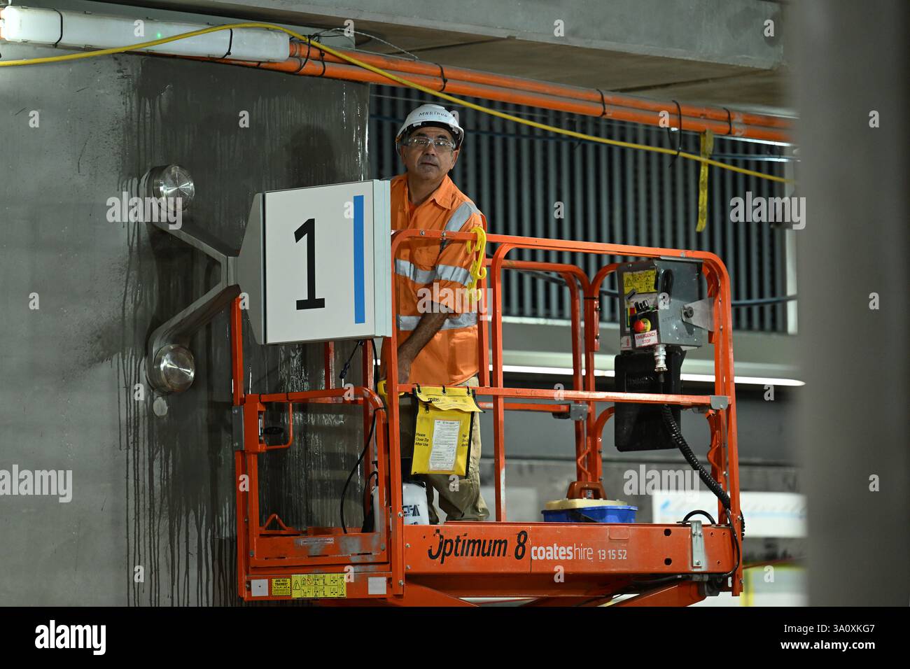 Melbourne, Australia. 06th Mar, 2025. Construction workers are seen ...