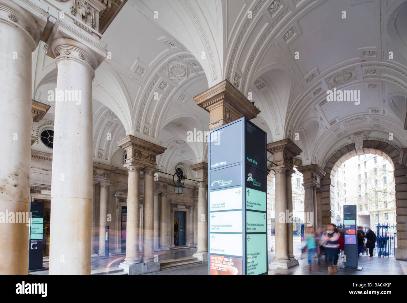 Somerset House, North Wing, London. Visitors navigate the Courtauld ...