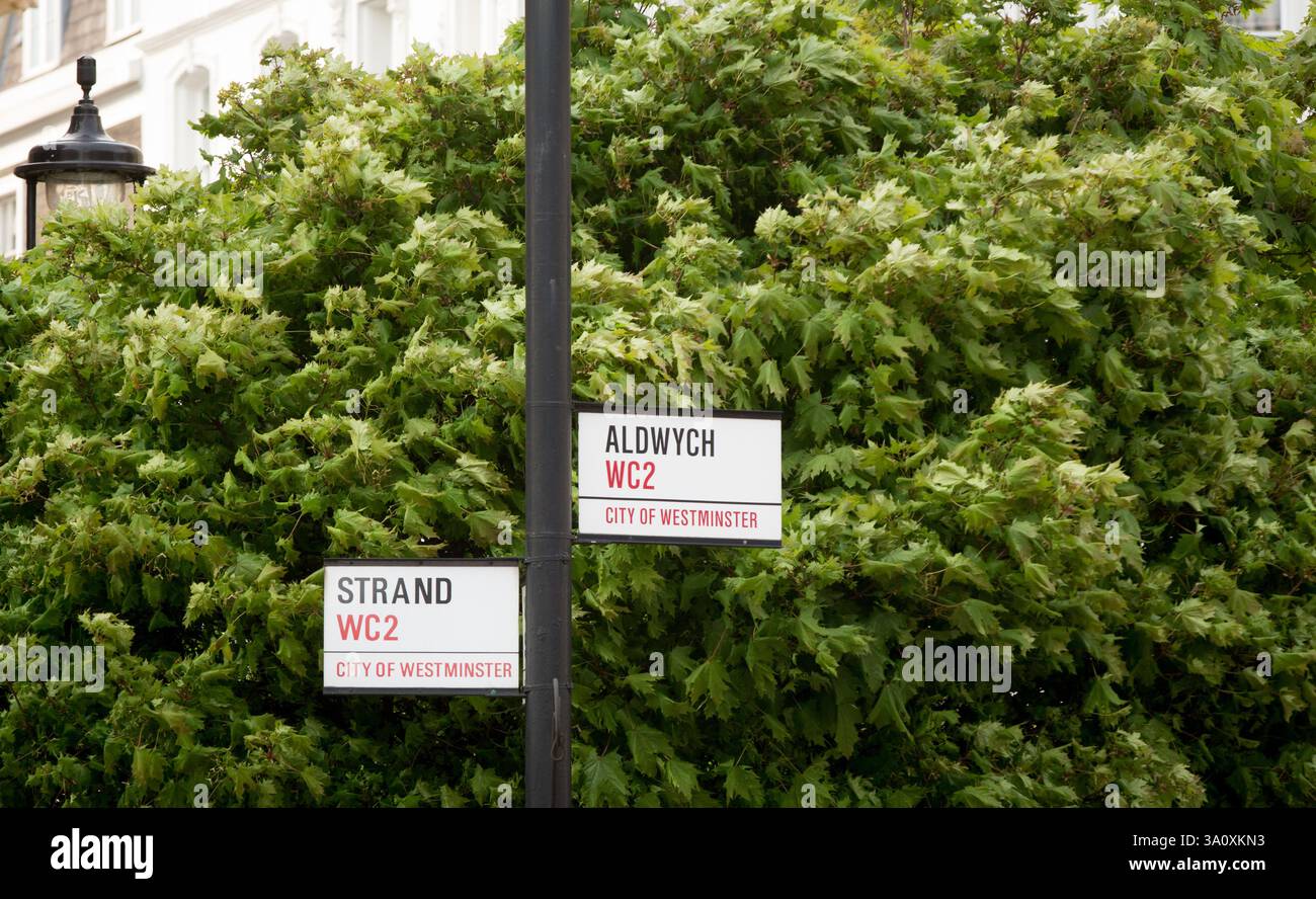 Street signs for Aldwych WC2 and Strand WC2, City of Westminster ...