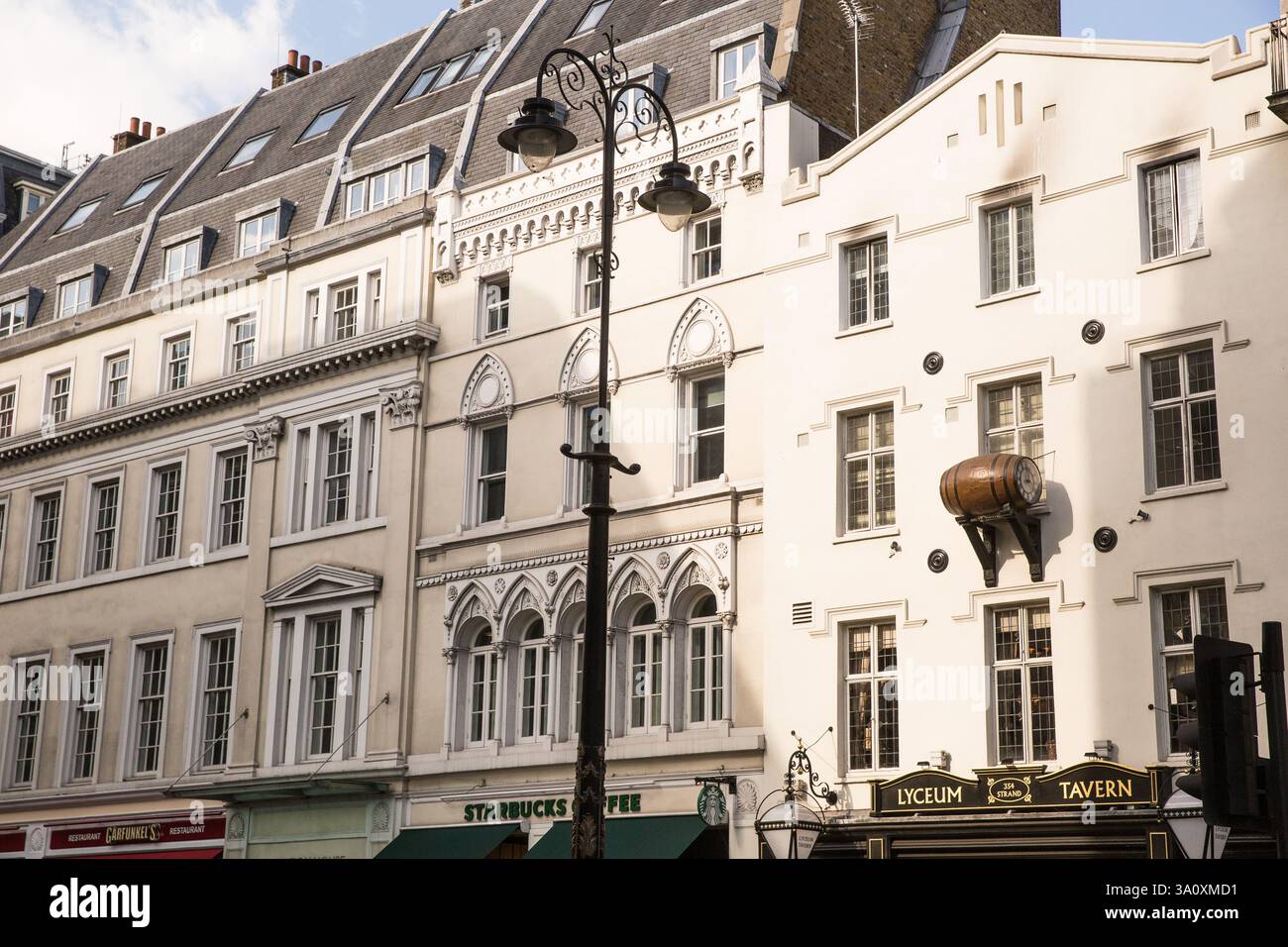 Victorian-era buildings on the Strand in London, featuring a Starbucks ...