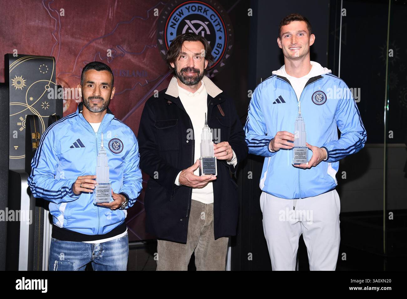 (L-R) Maxi Moralez, Andrea Pirlo and Matt Freese visit the Empire State ...