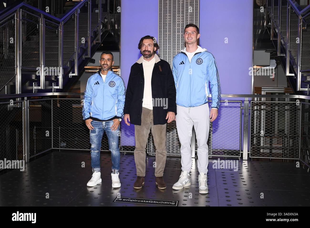 (L-R) Maxi Moralez, Andrea Pirlo and Matt Freese visit the Empire State ...