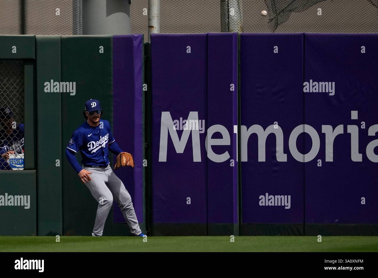 Los Angeles Dodgers' James Outman can't catch a home run ball hit by ...