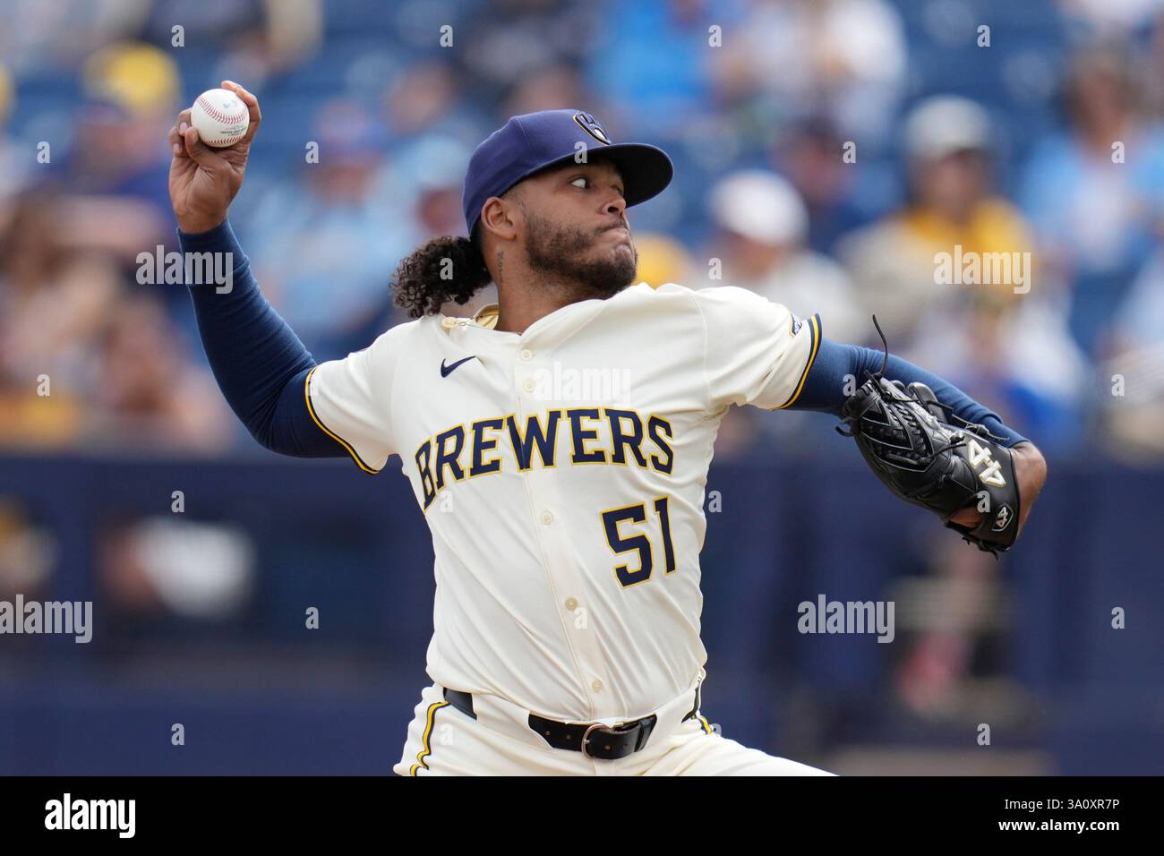 Milwaukee Brewers starting pitcher Freddy Peralta throws against the ...