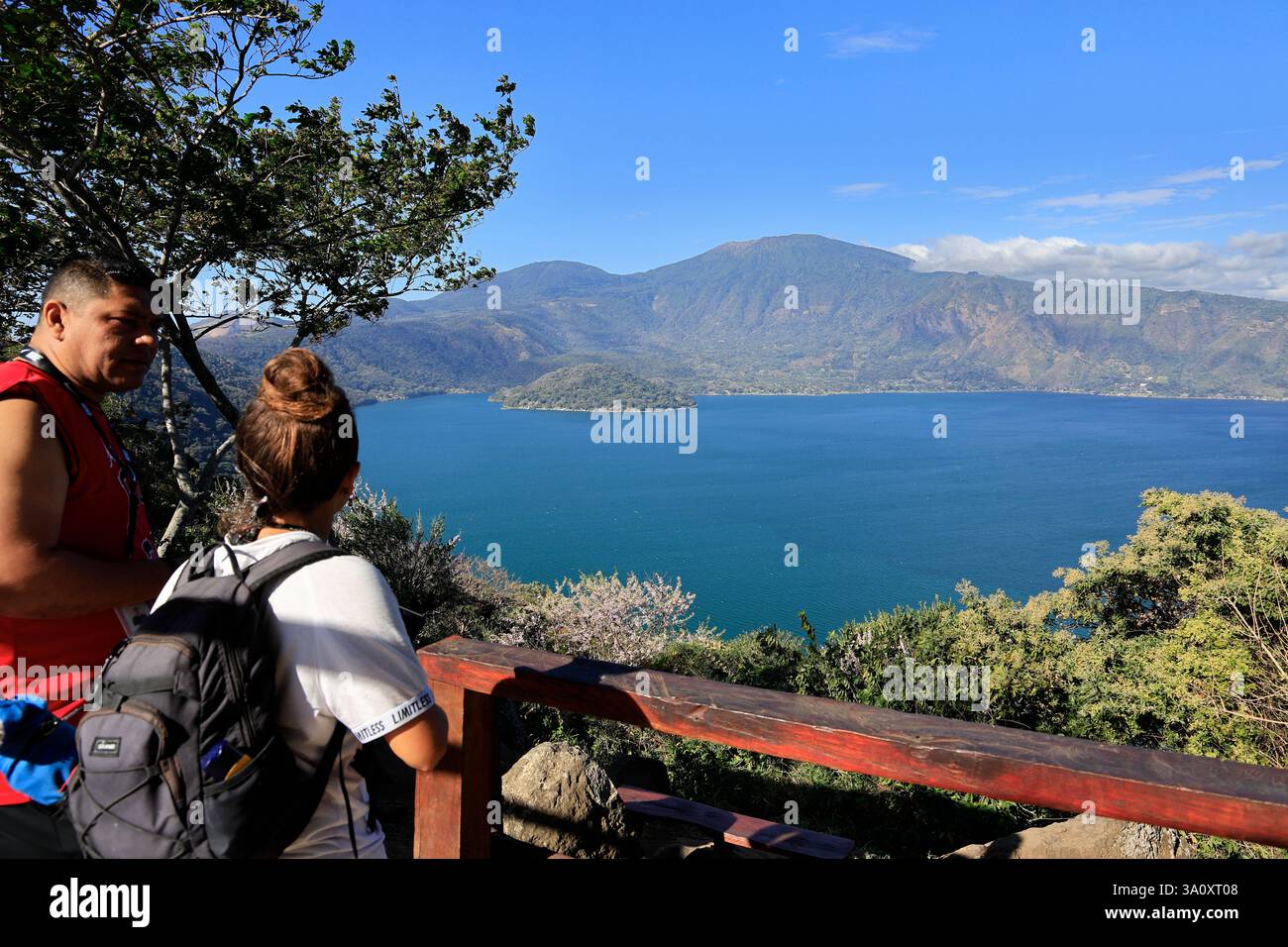 Lago de Coatepeque Lake with visitors in a lookout in foreground.Cerro ...