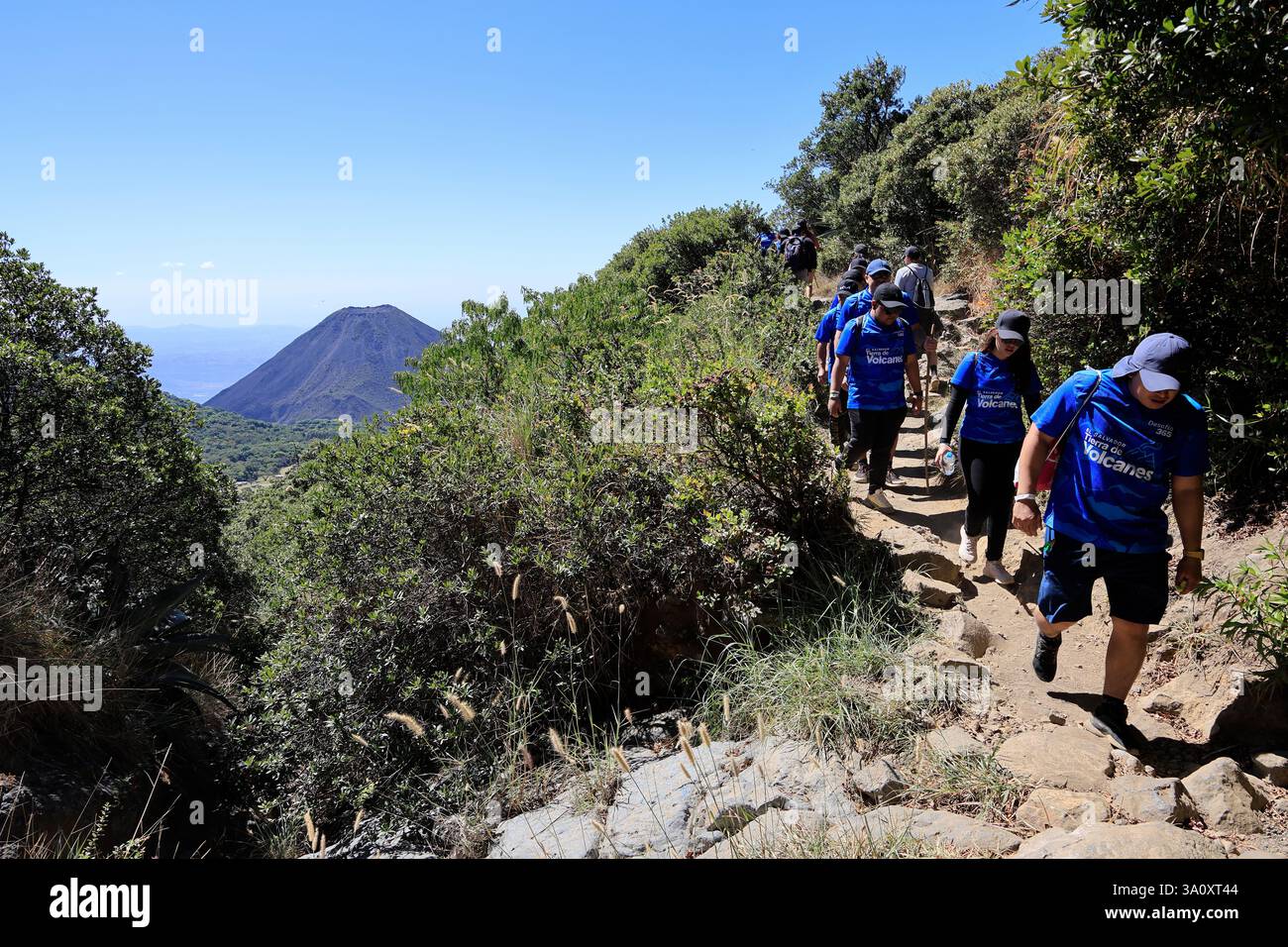 Visitors climbing the Santa Ana Volcano the highest and active volcano ...