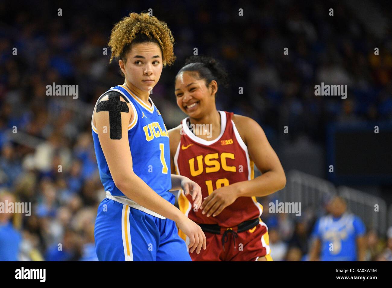 LOS ANGELES, CA - MARCH 01: UCLA Bruins guard Kiki Rice (1) and USC ...