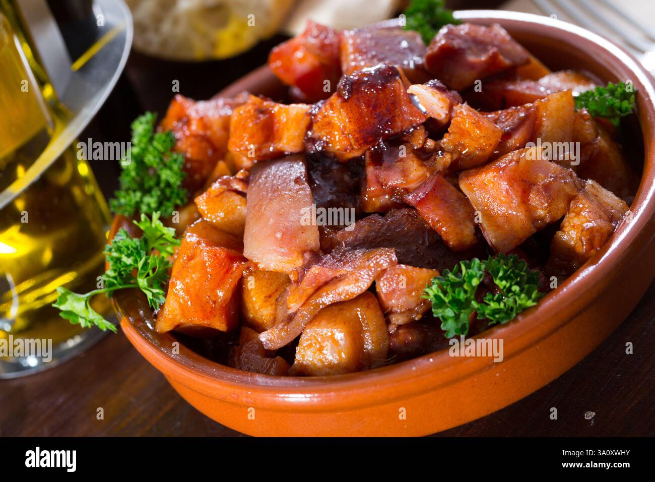 Spanish dish - roasted pig nose and cheeks Stock Photo - Alamy