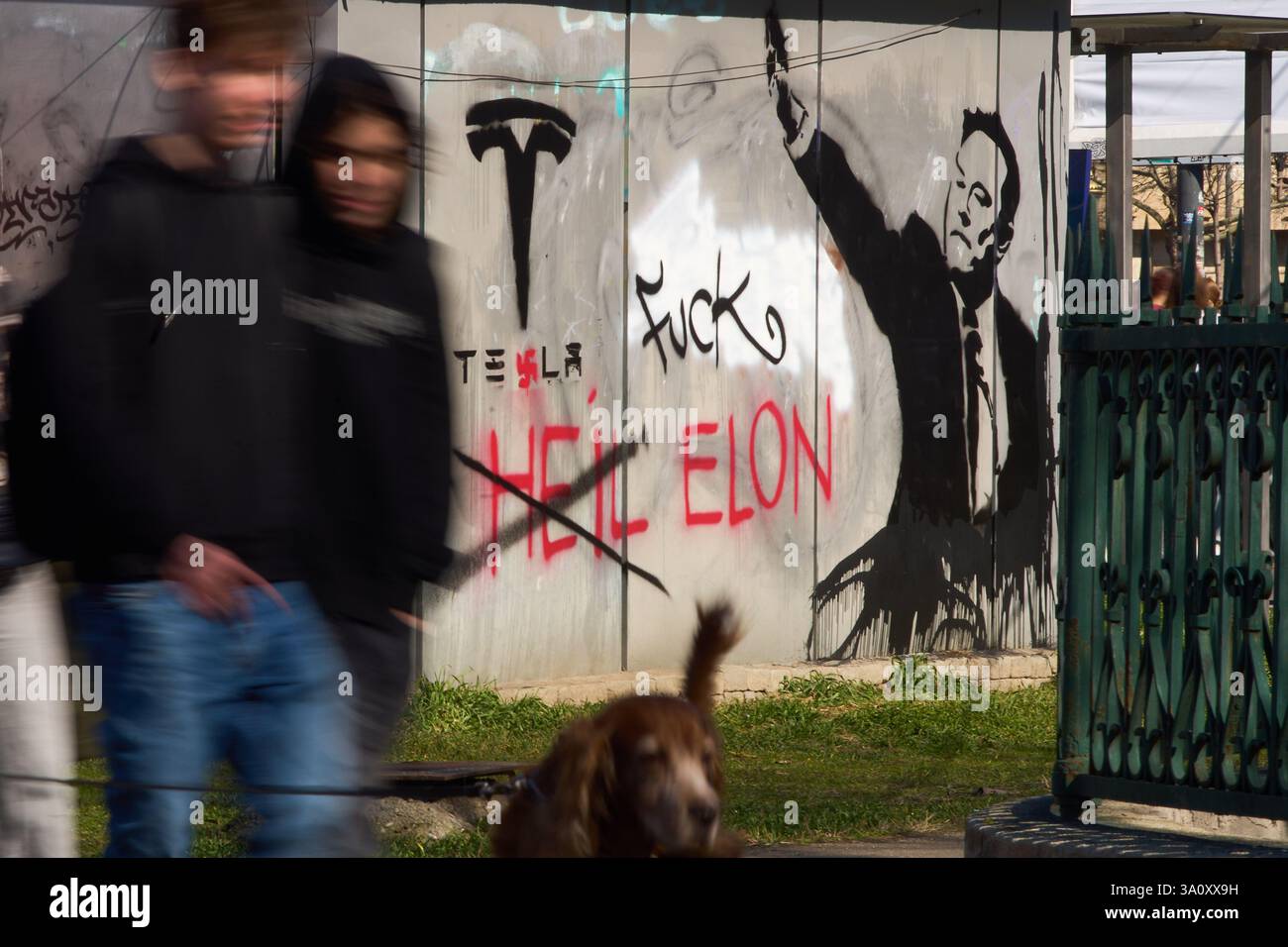 Bucharest, Romania. 5th Mar, 2025: People walk past a mural resembling ...