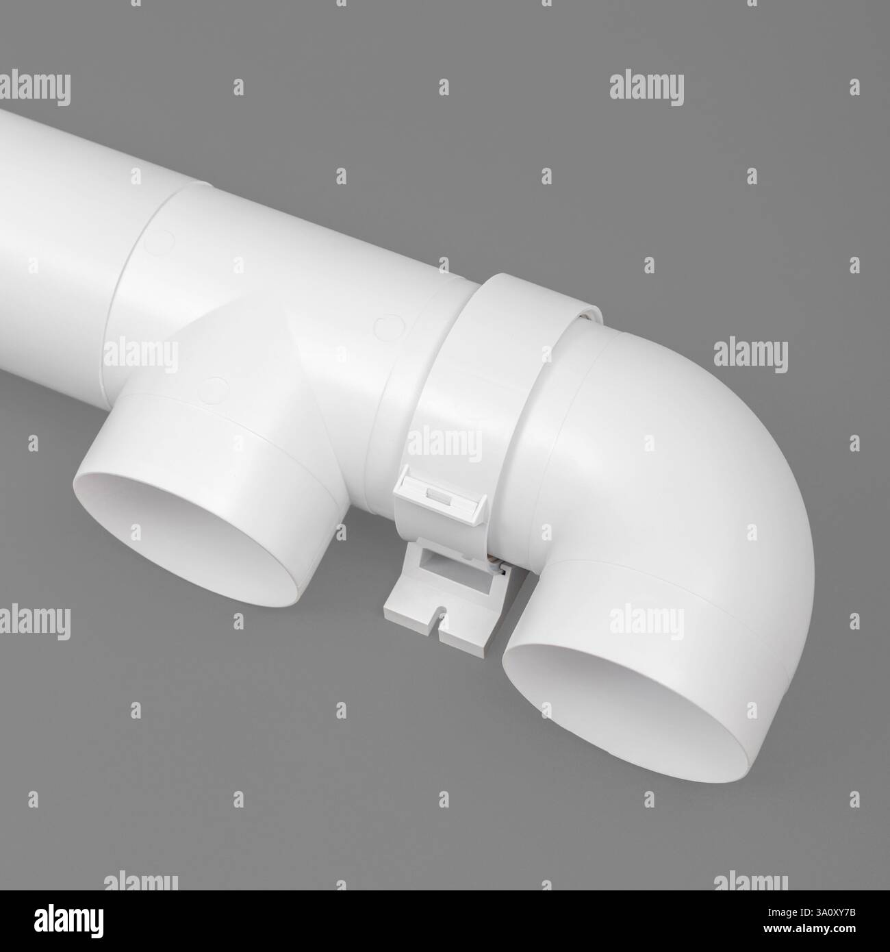 White round plastic pipe on a gray background. Ventilation system Stock ...