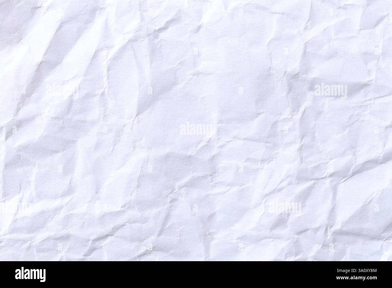 Close-up view of a crumpled white paper texture, perfect for various ...