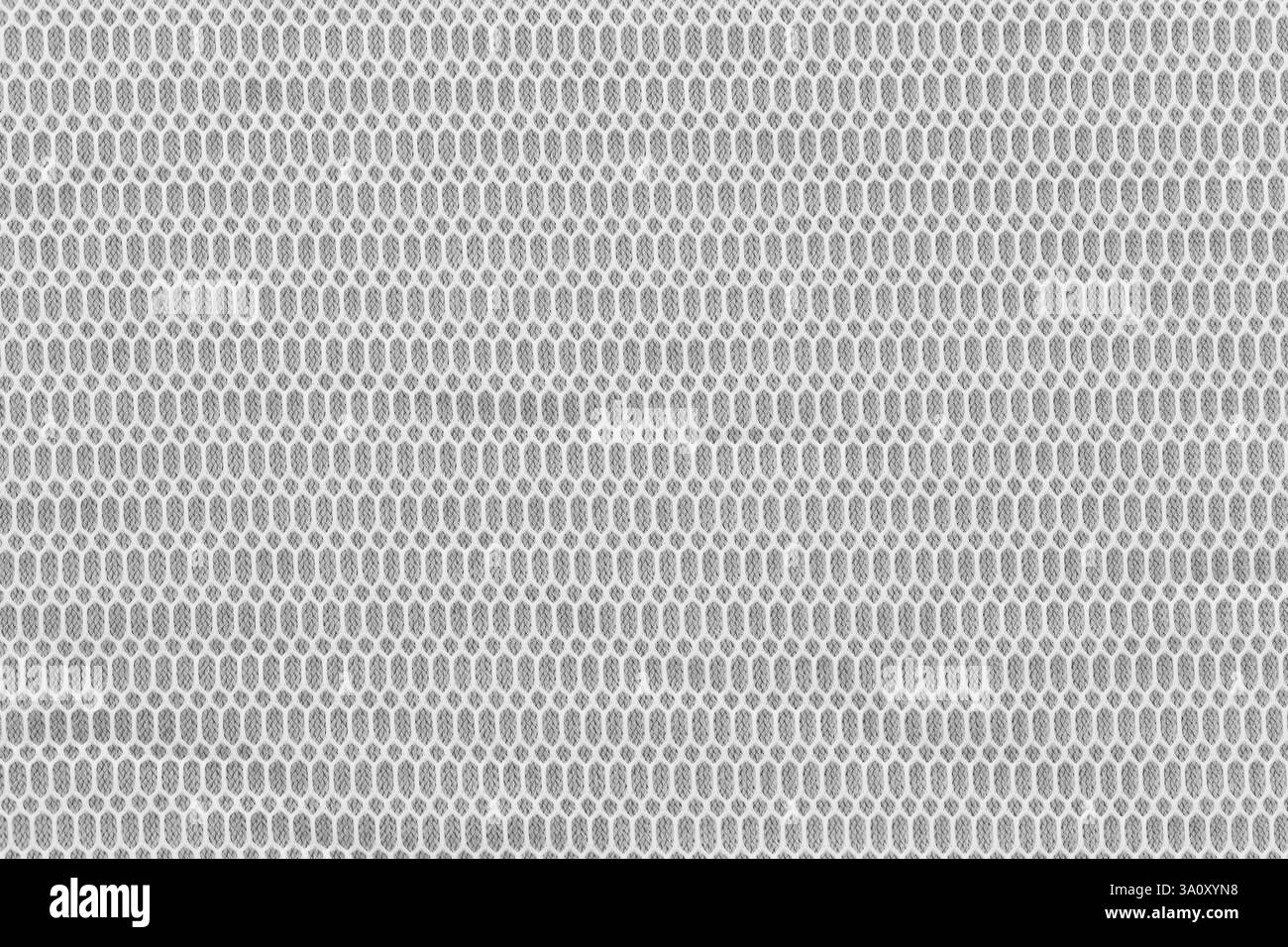 Filter sheet has features a detailed honeycomb pattern in white and ...