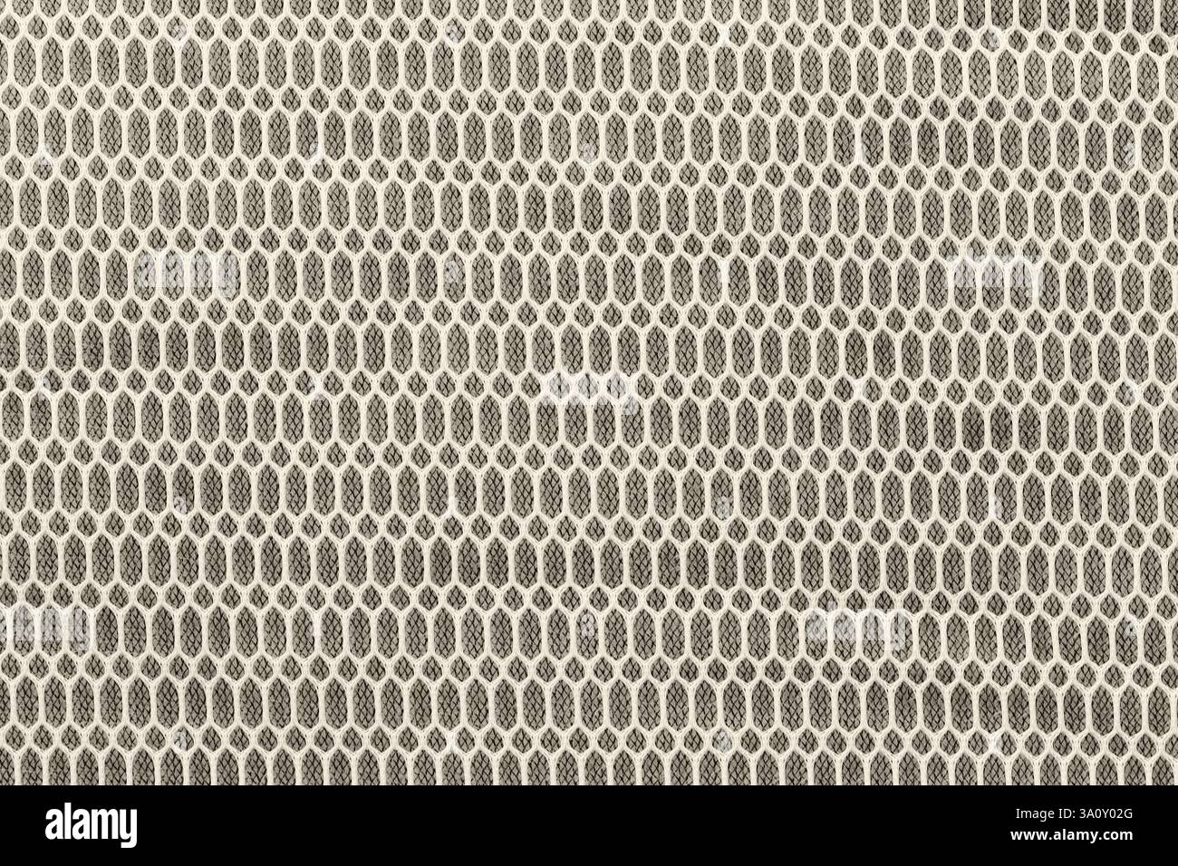 Filter sheet has features a detailed honeycomb pattern in white and ...