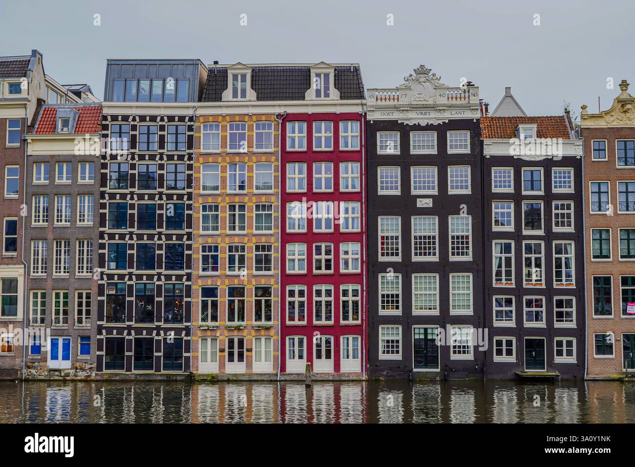 This aerial view of Amsterdam, Netherlands showcases its iconic canal ...