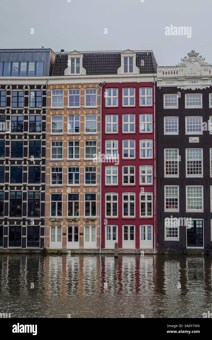 This aerial view of Amsterdam, Netherlands showcases its iconic canal ...