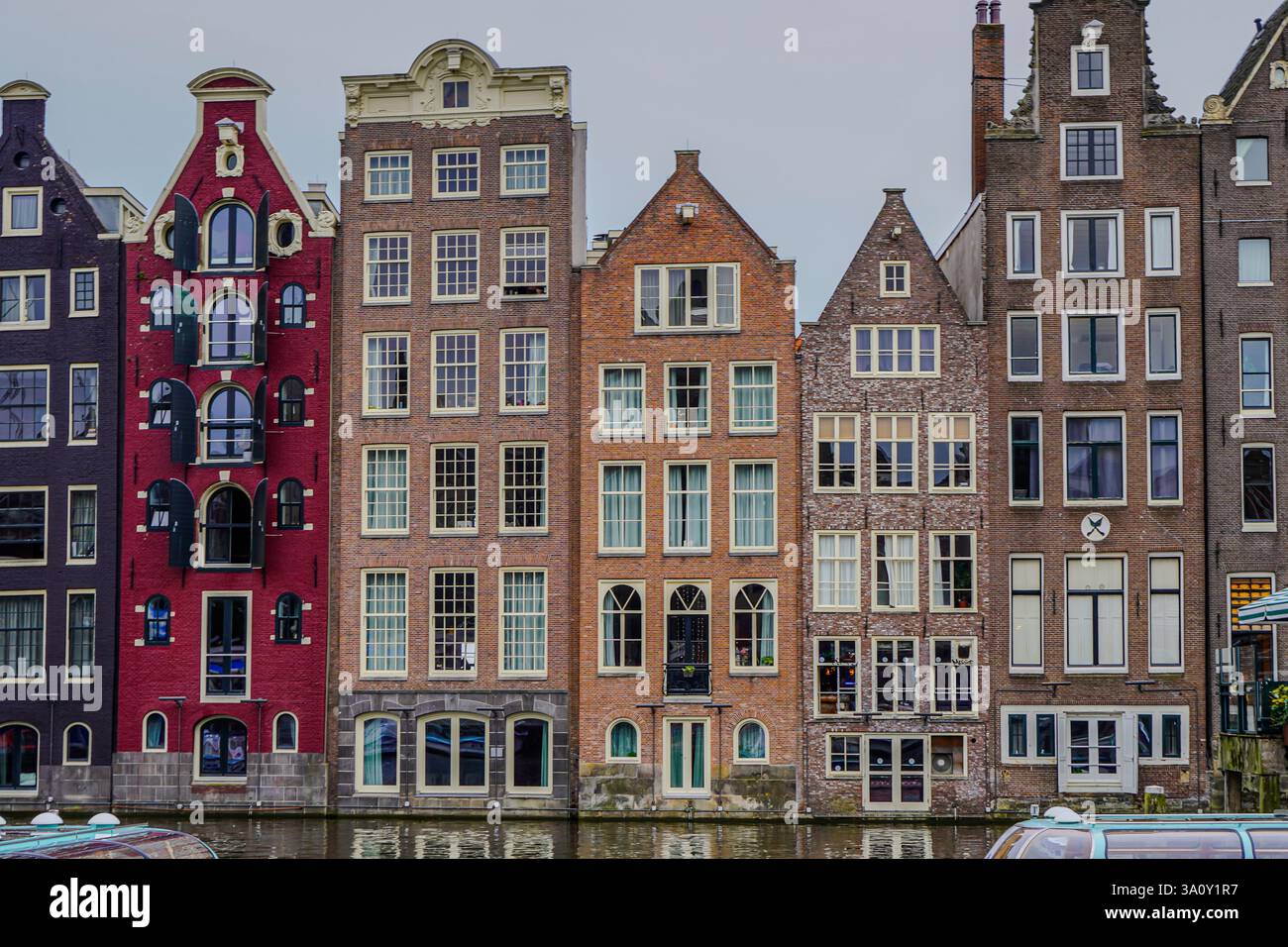 This aerial view of Amsterdam, Netherlands showcases its iconic canal ...