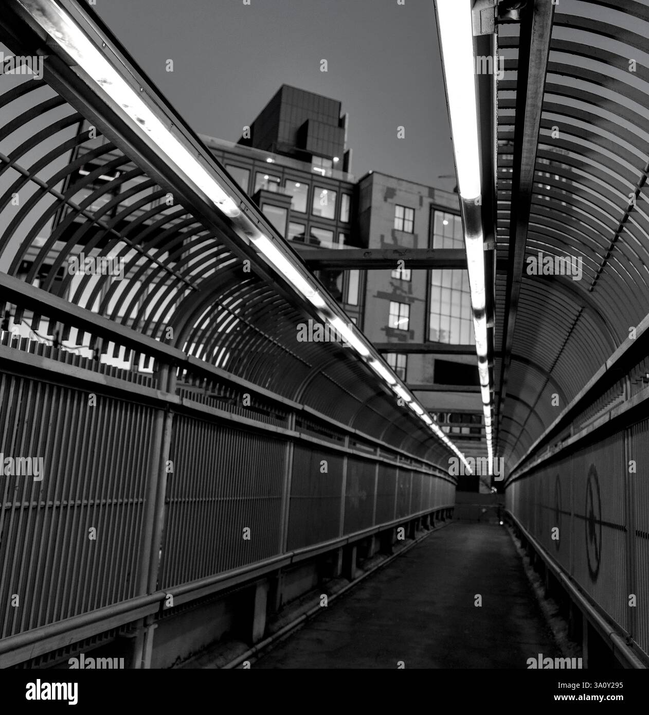 fenced bridge overpass fence with tube fluorescent light tunnel ...
