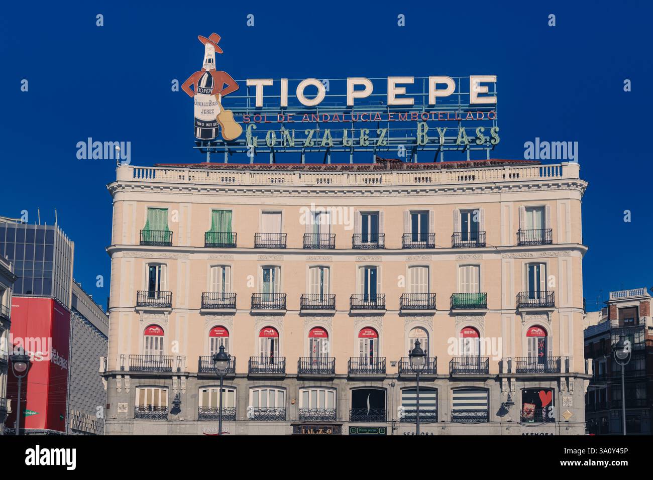 Madrid, Spain. February 03, 2025. Tio Pepe neon advertisment at Puerta ...