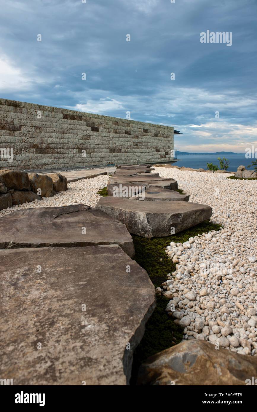 Photo shows the exterior of the gallery and stone gardens at the Enoura ...