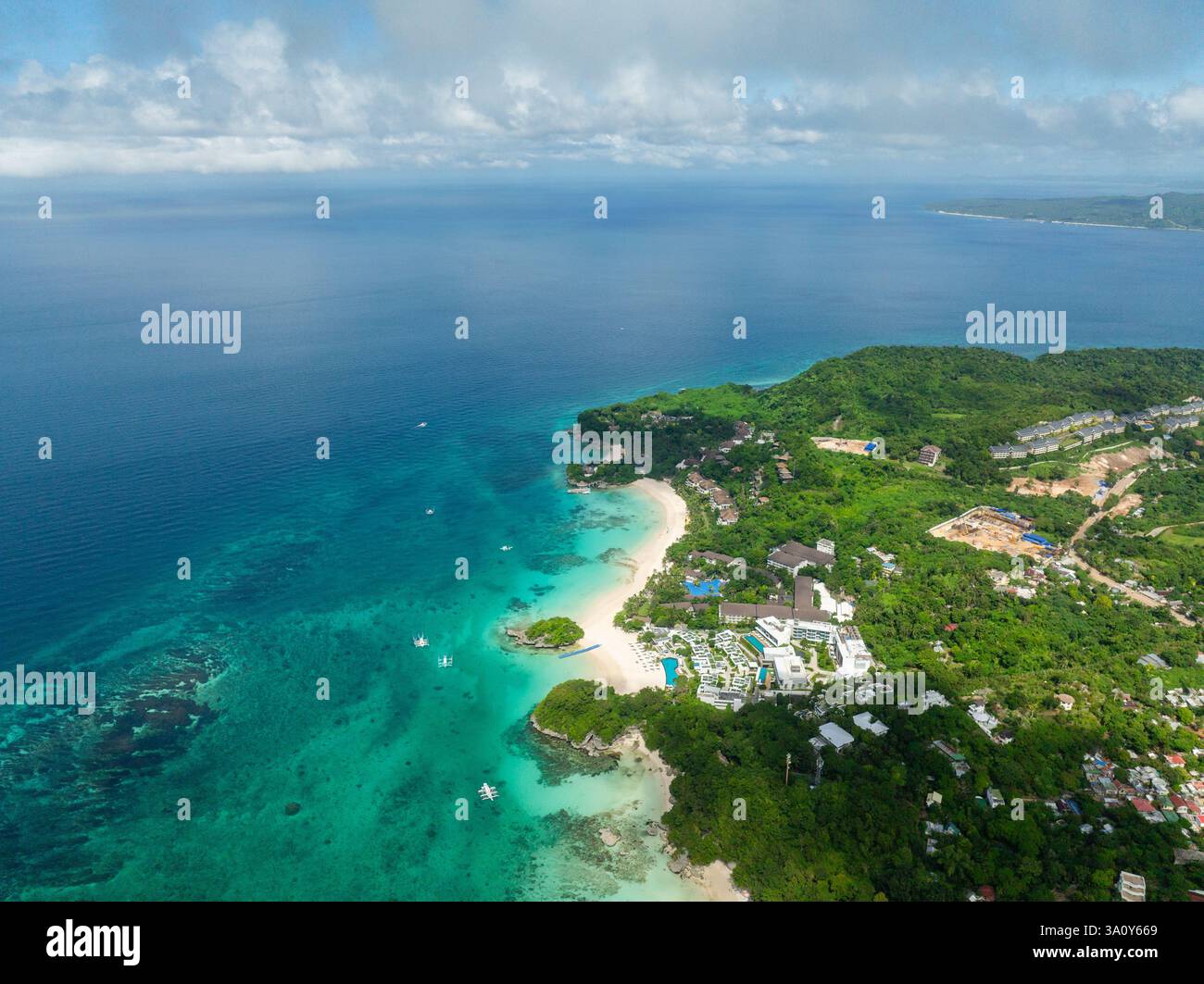 Aerial view of white sand and turquoise waters in Punta Bunga Beach ...