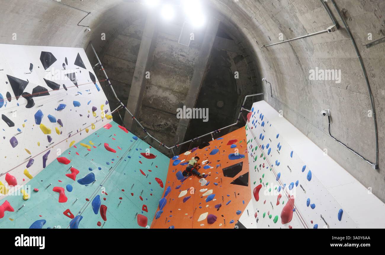 SHANGHAI, CHINA - MARCH 5, 2025 - Extreme sports enthusiasts climb at a ...