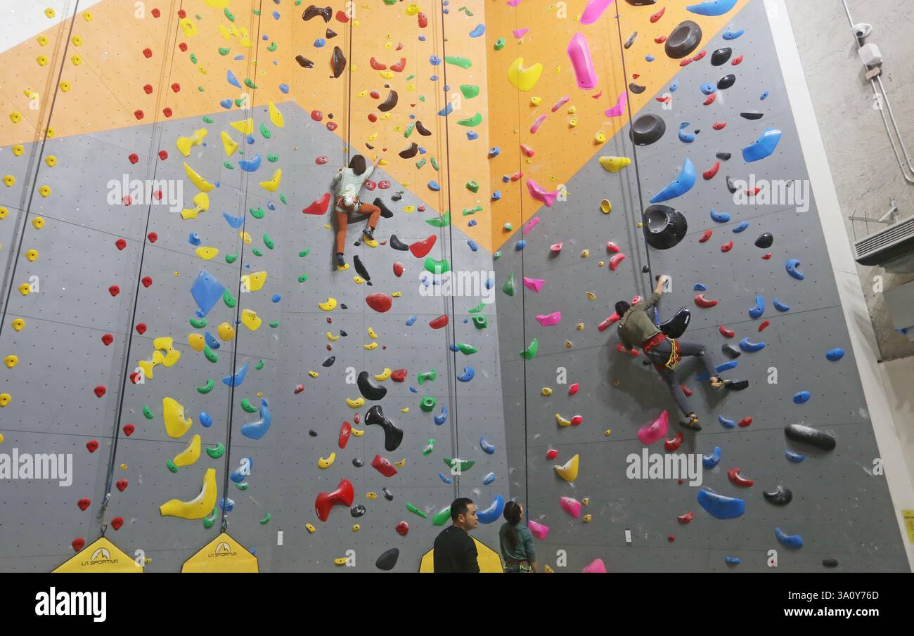 SHANGHAI, CHINA - MARCH 5, 2025 - Extreme sports enthusiasts climb at a ...