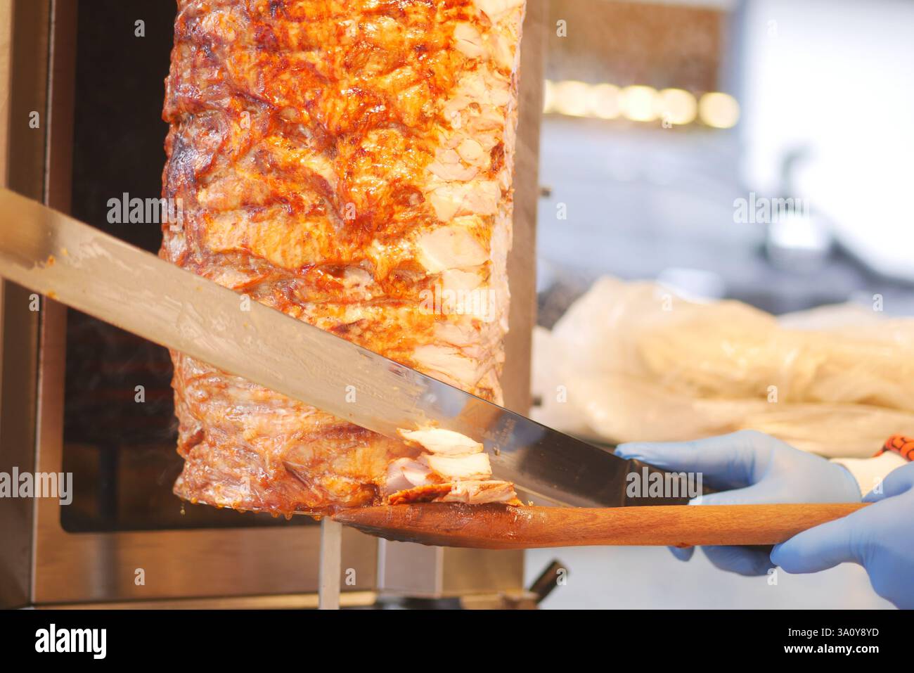Kitchen staff rotisserie meat hi-res stock photography and images - Alamy