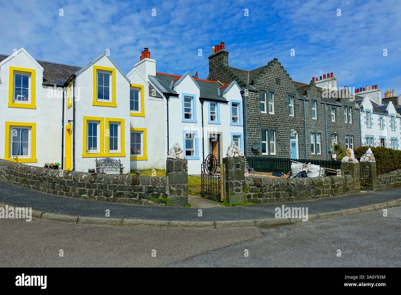 Row of lovely stone houses in the wee village of Port Ellen on the ...