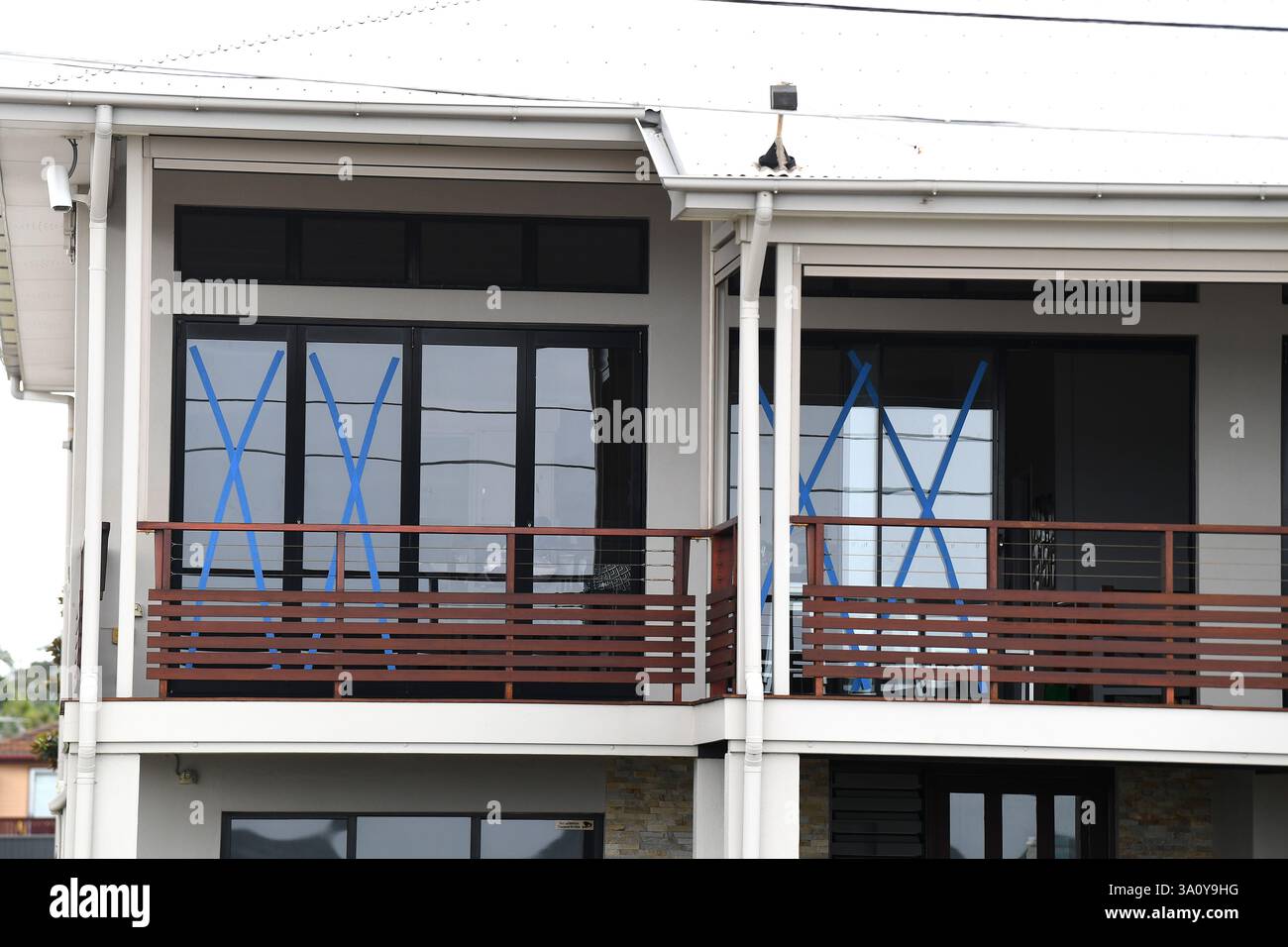 Brisbane, Australia. 06th Mar, 2025. Windows are taped at a house in ...