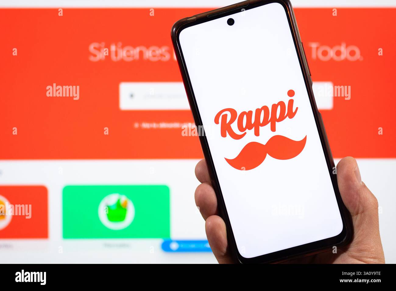 BOGOTA, COLOMBIA - MARCH 05 OF 2025 A male hand holding a smartphone ...