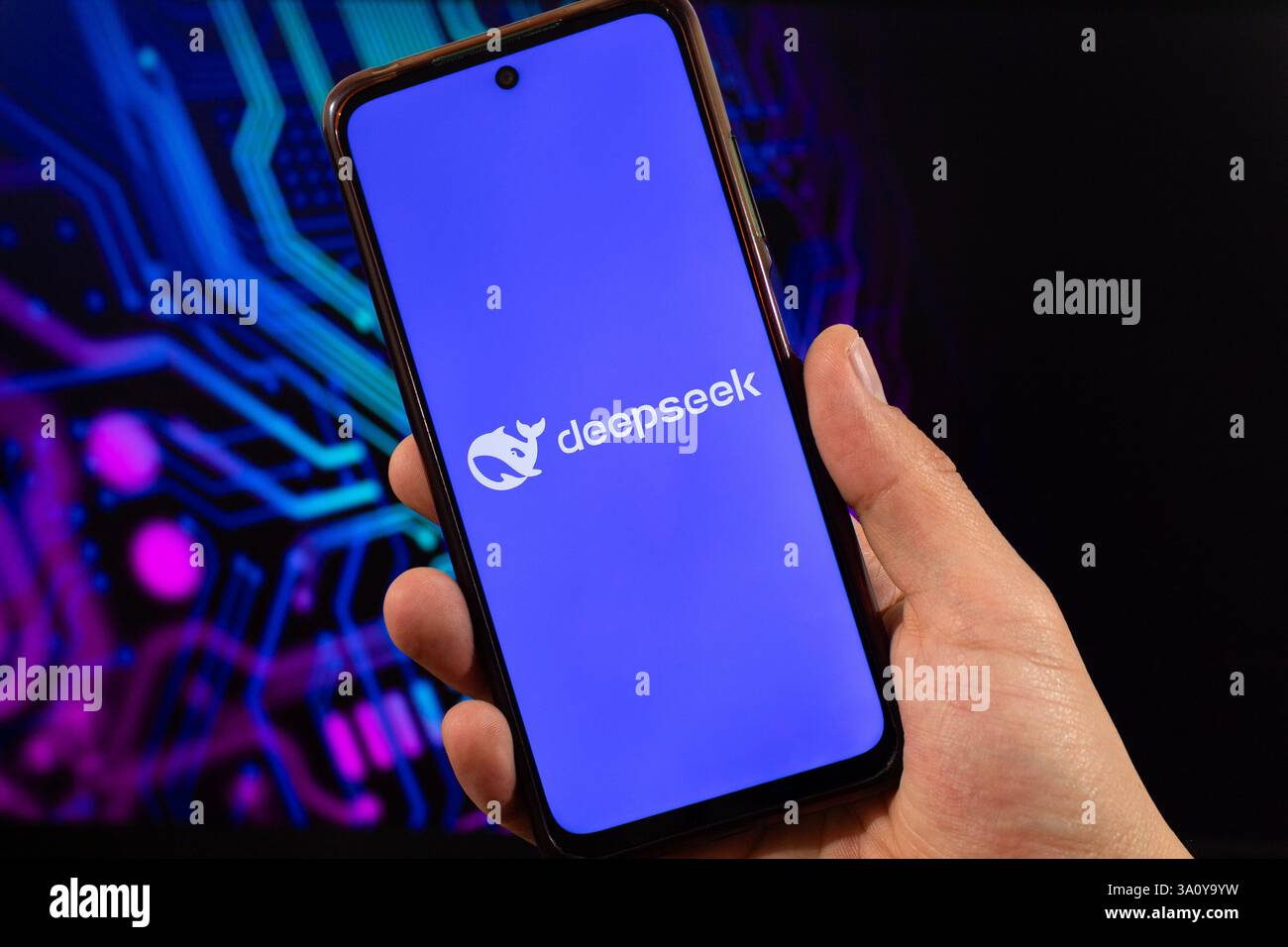 BOGOTA, COLOMBIA - MARCH 05 OF 2025 A male hand holding a smartphone ...