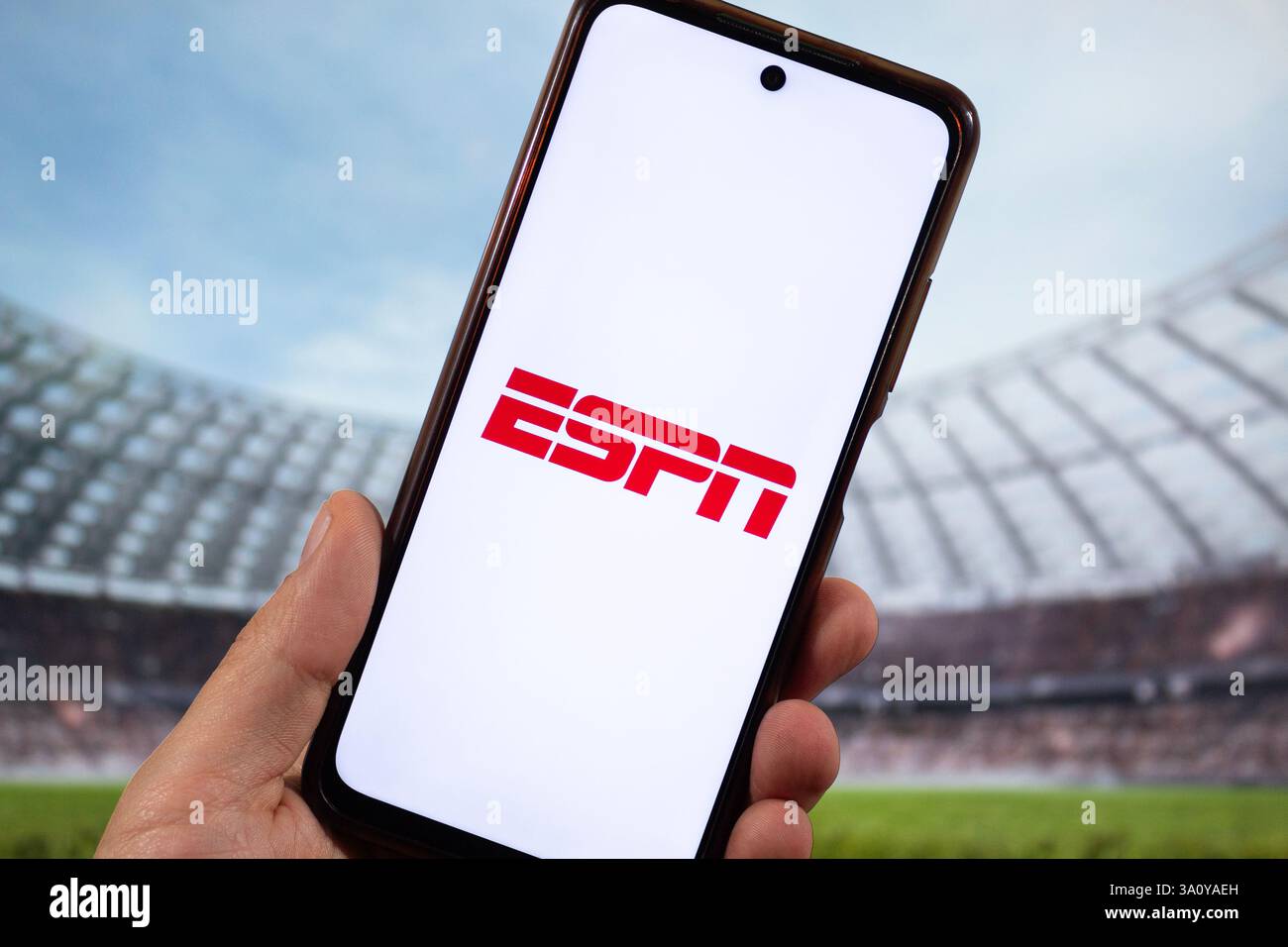 BOGOTA, COLOMBIA - MARCH 05 OF 2025 a male left hand with ESPN Sports ...