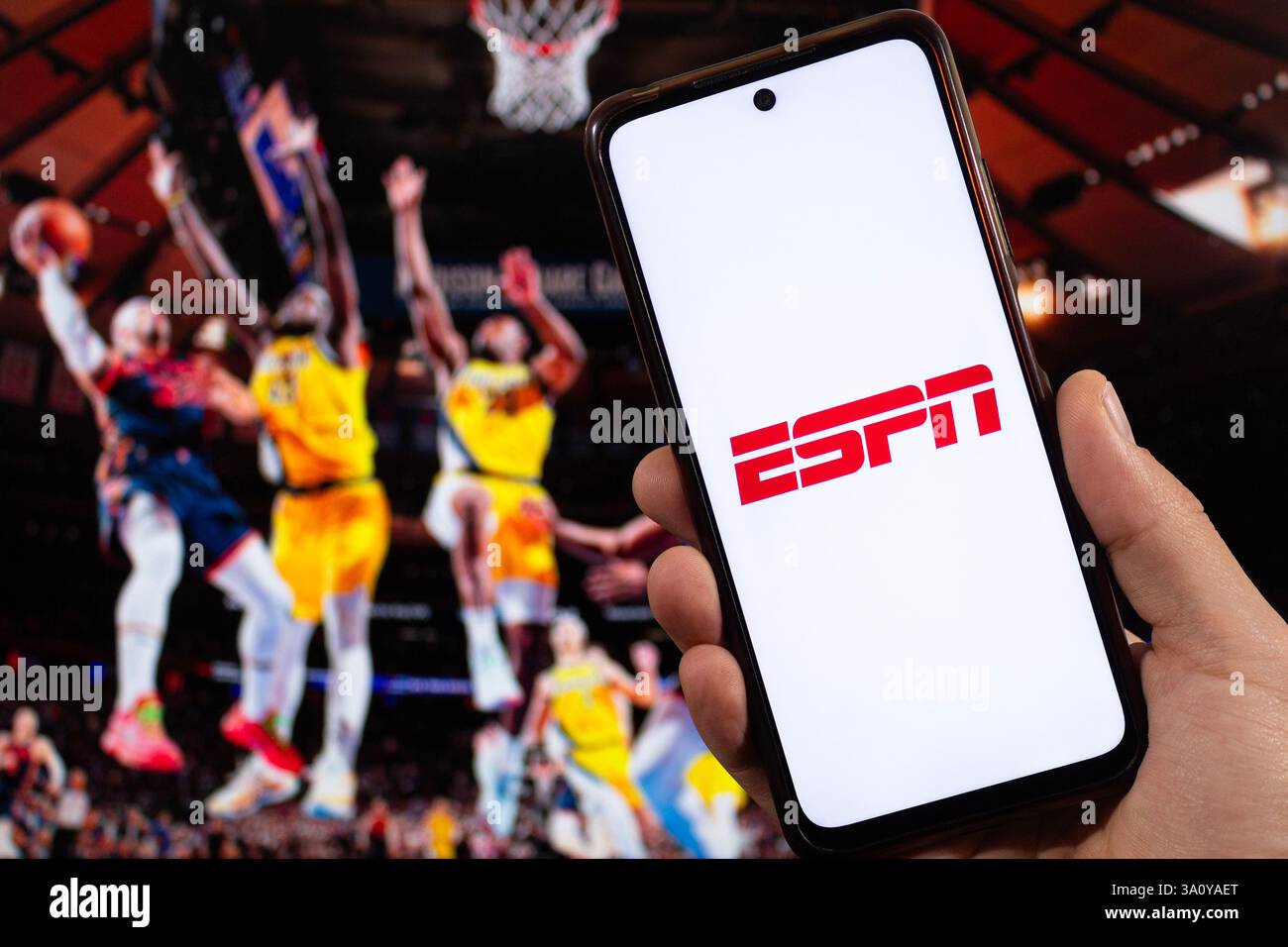 BOGOTA, COLOMBIA - MARCH 05 OF 2025 a male right hand with ESPN Sports ...