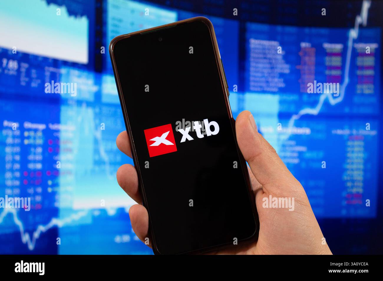 BOGOTA, COLOMBIA - MARCH 05 OF 2025 a smartphone with xtb finance app ...