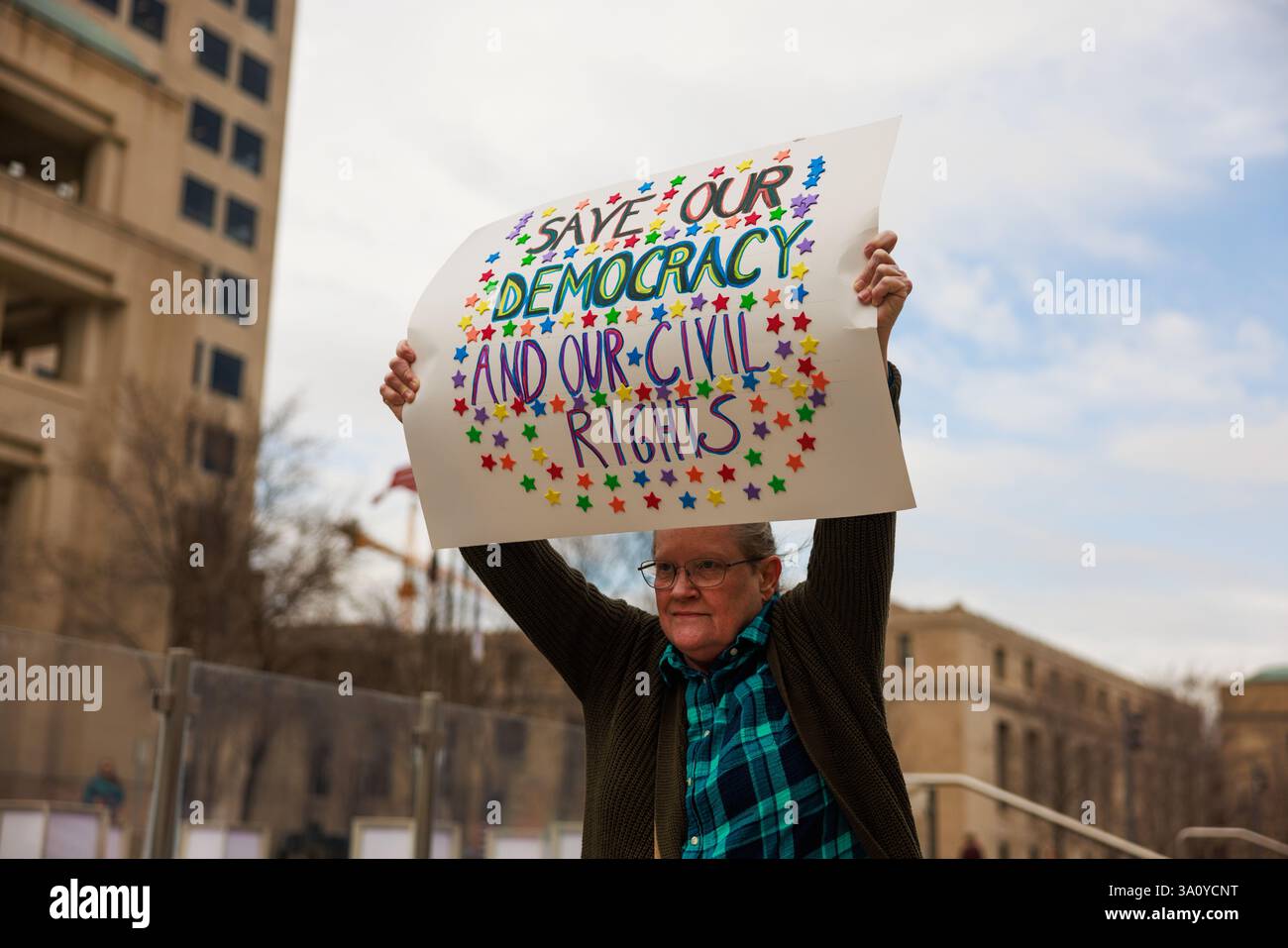Indianapolis, United States. 04th Mar, 2025. A protester holds a sign ...