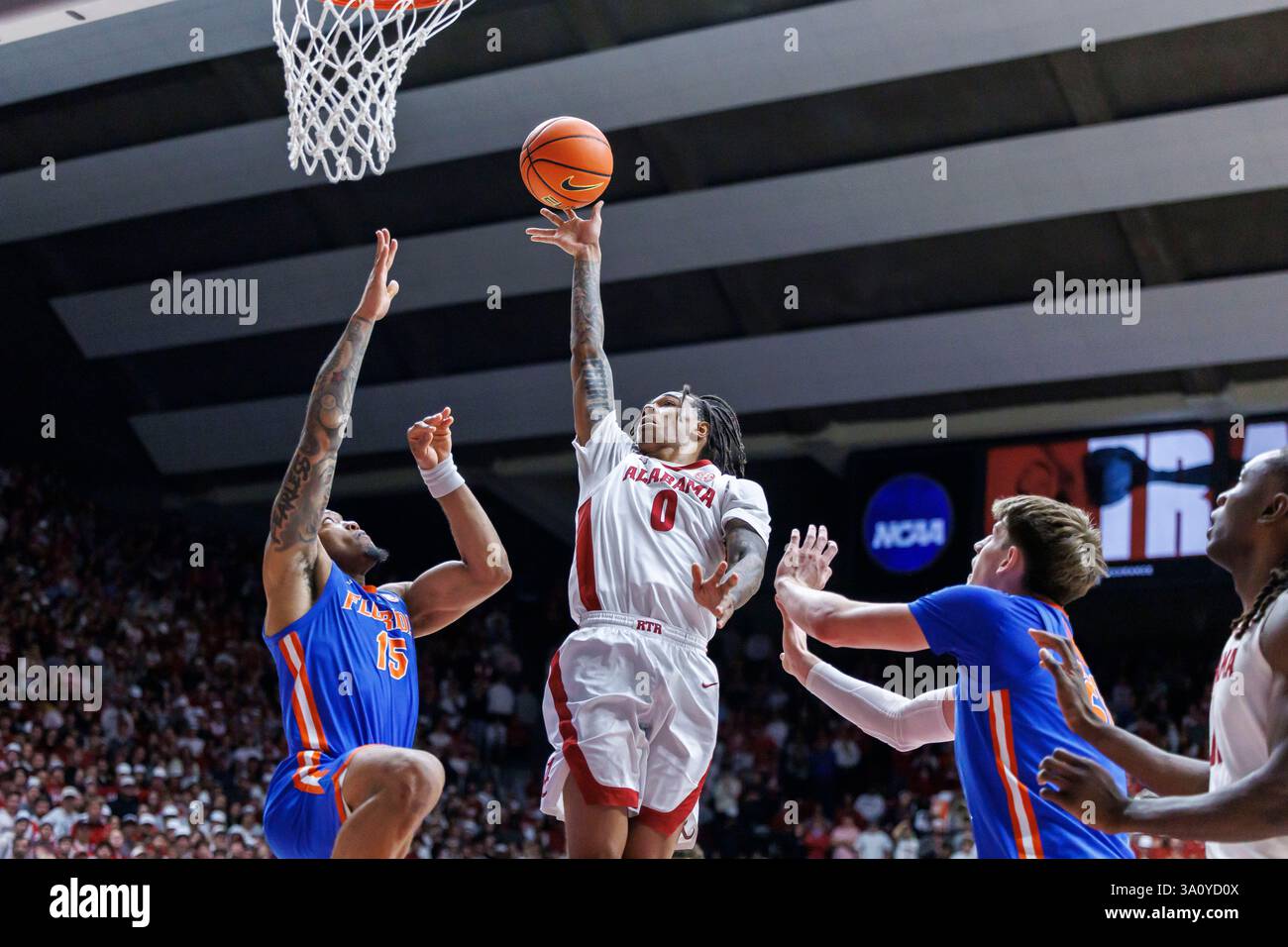 Alabama guard Labaron Philon (0) shoots over Florida guard Alijah ...