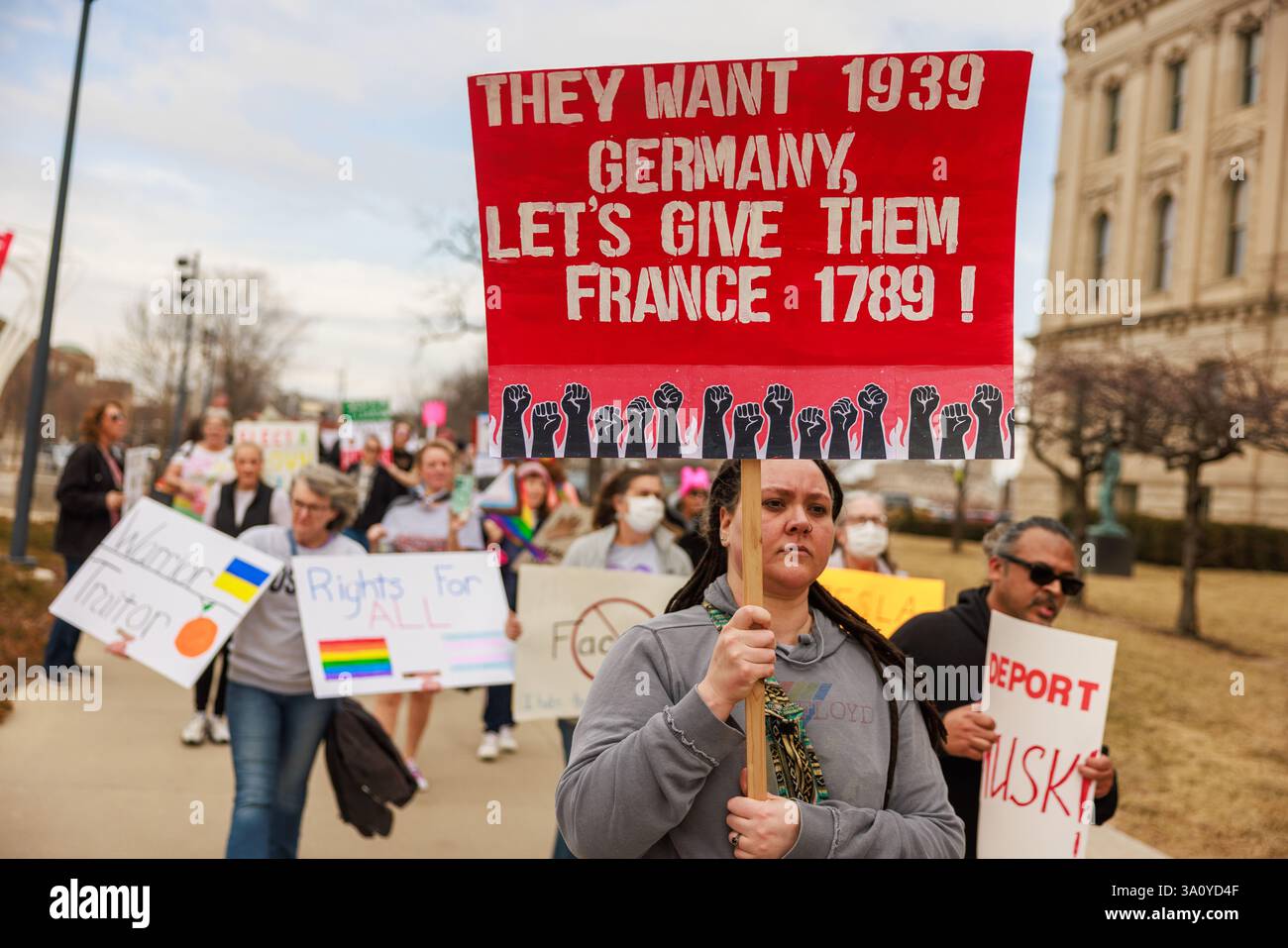 Indianapolis, United States. 04th Mar, 2025. A protester holds a sign ...