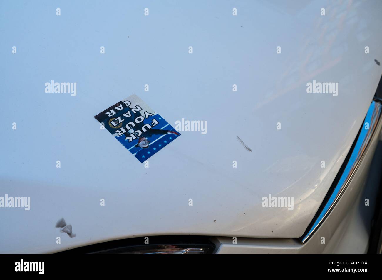Seattle, USA. 5th Mar 2025. Anti - Elon Musk stickers seen on a Tesla ...
